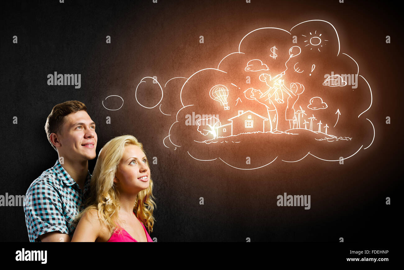 Conceptual image of young couple hugging each other and dreaming Stock ...