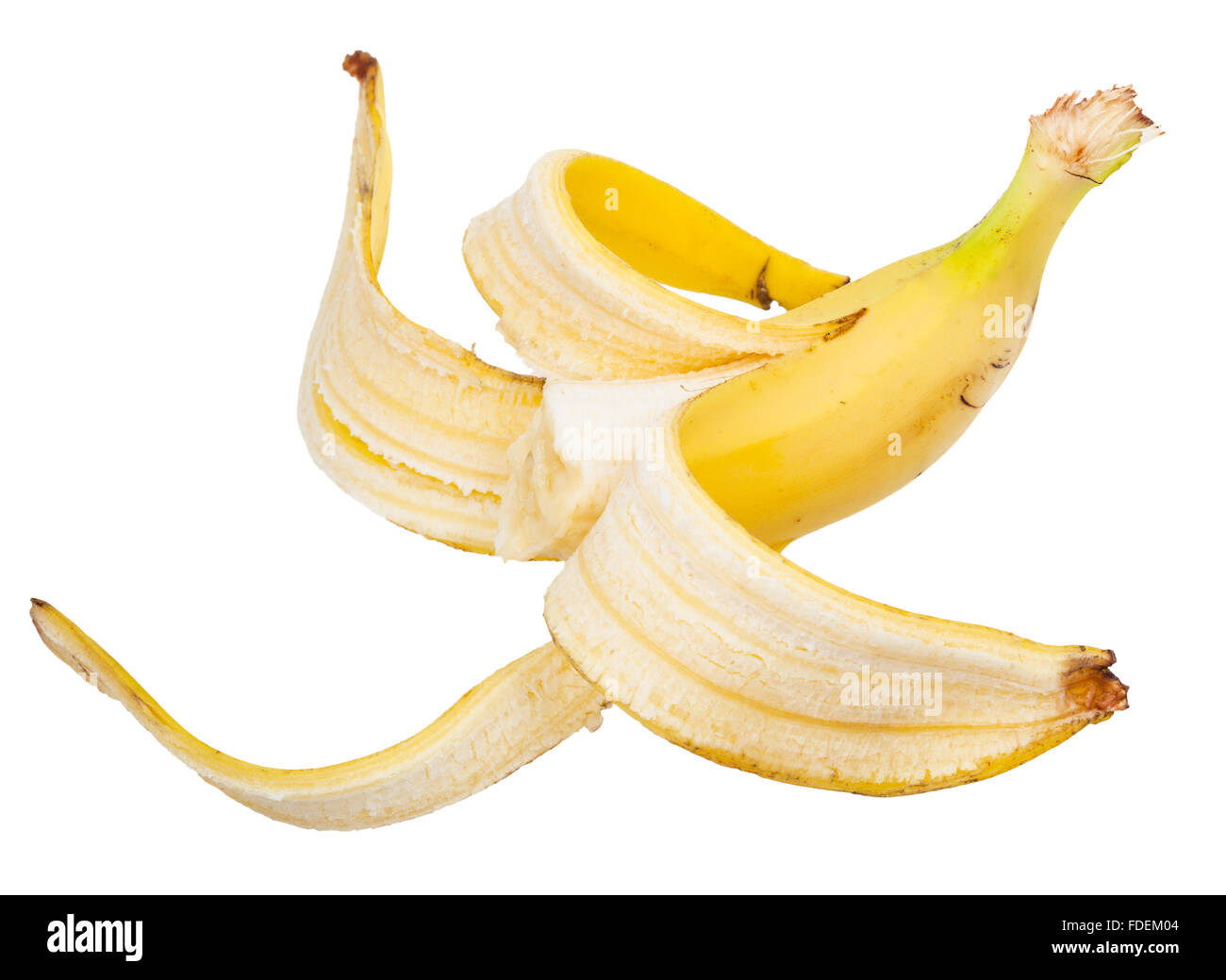 half ripe banana in the peel isolated on white background Stock Photo ...