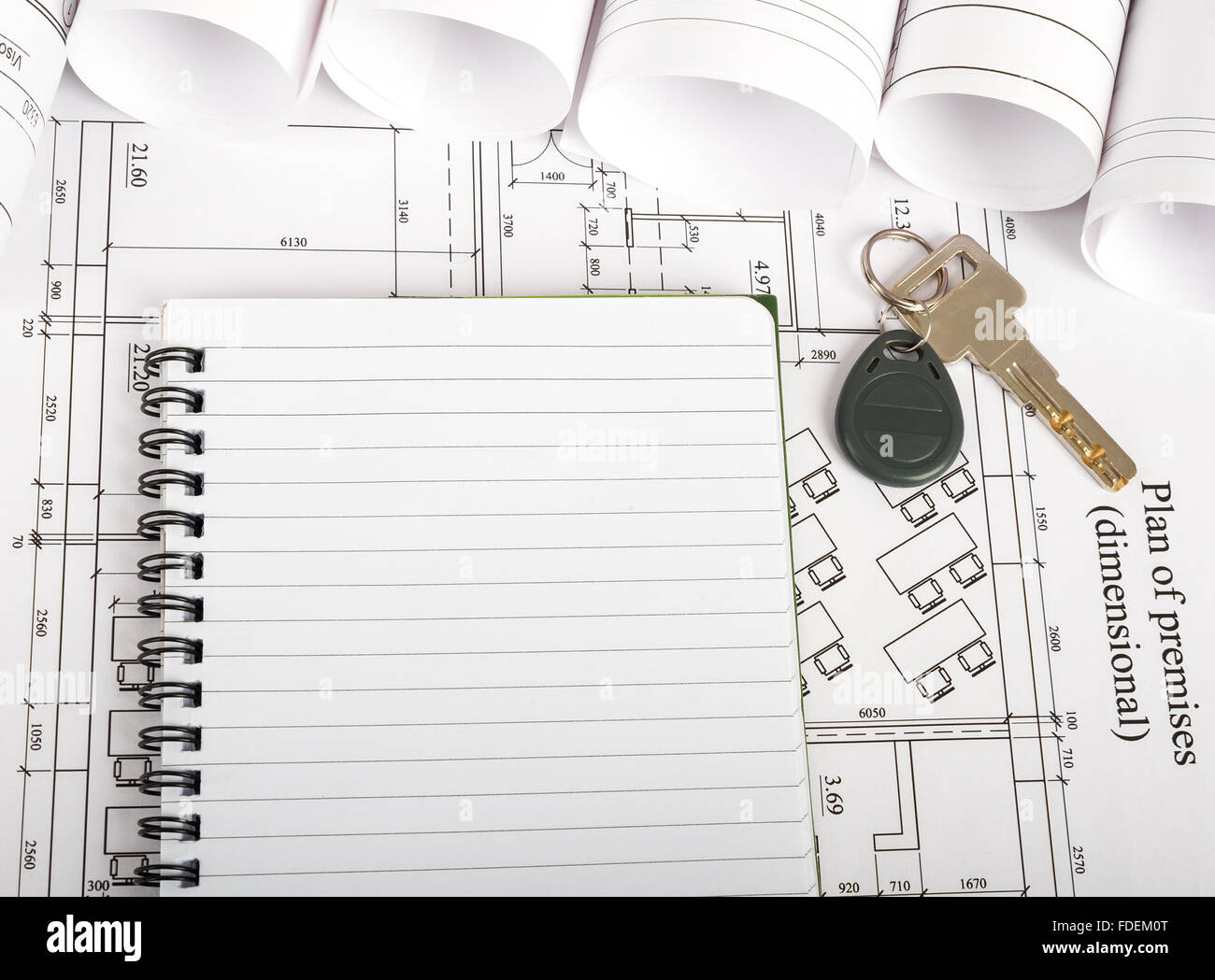 Copy book with key on blueprint Stock Photo - Alamy