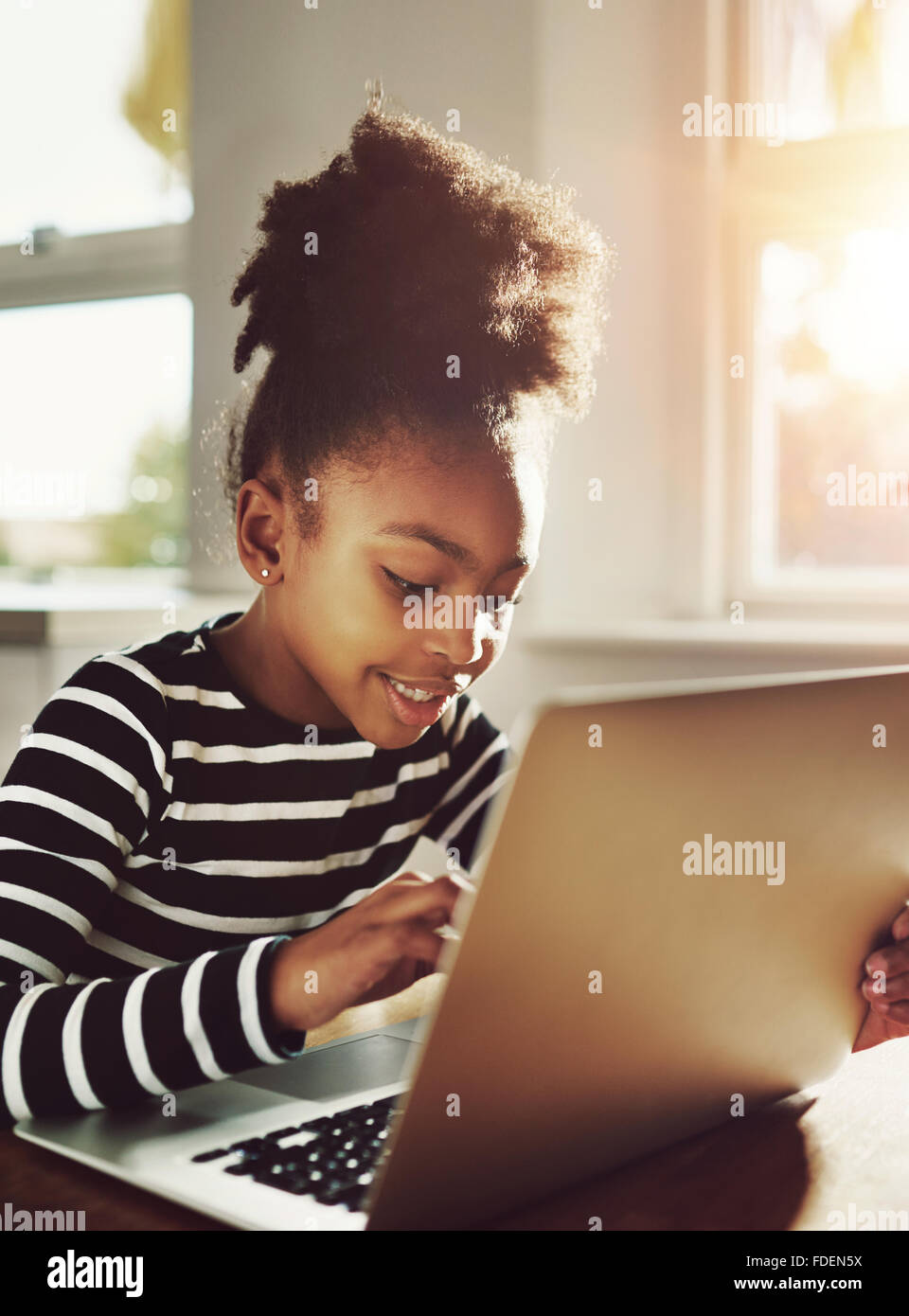 Close up Young African-American Girl Chatting to Someone Using her ...