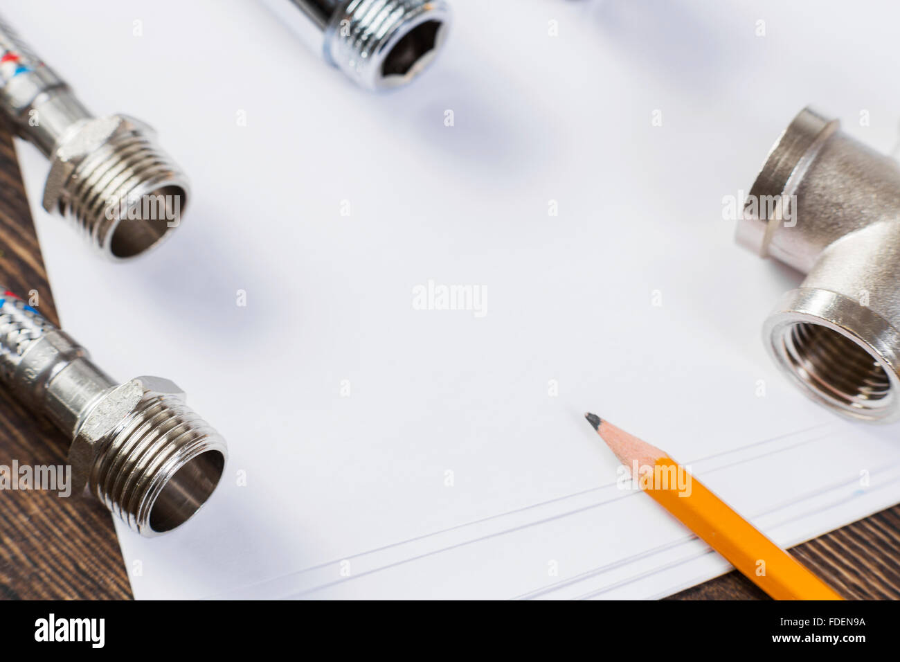 All kinds of plumbing and tools on white paper Stock Photo - Alamy