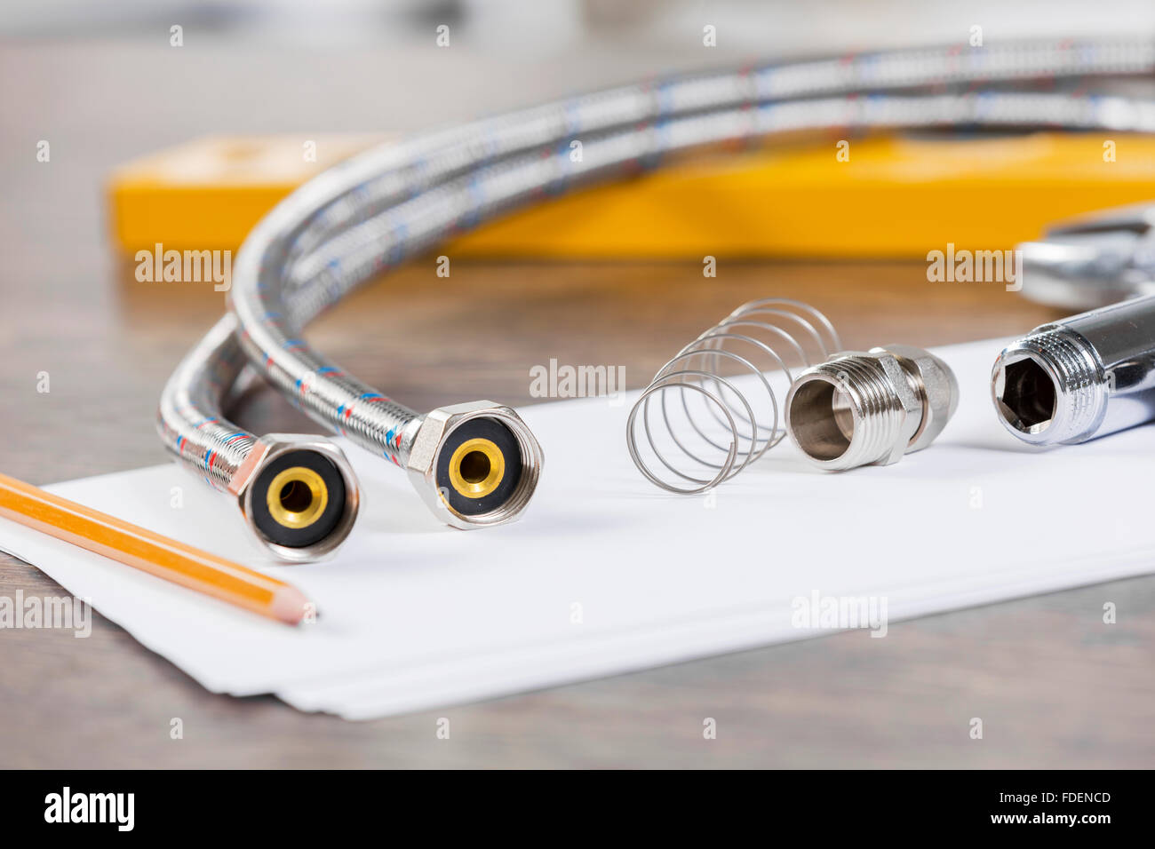 All kinds of plumbing and tools on sheet of paper Stock Photo - Alamy