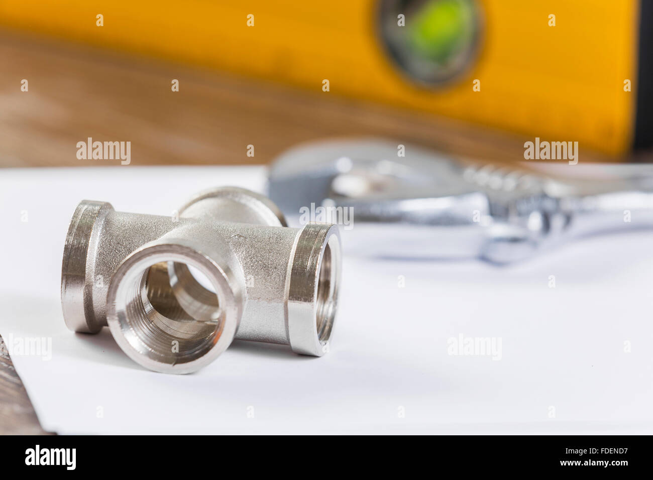 All kinds of plumbing and tools on sheet of paper Stock Photo - Alamy