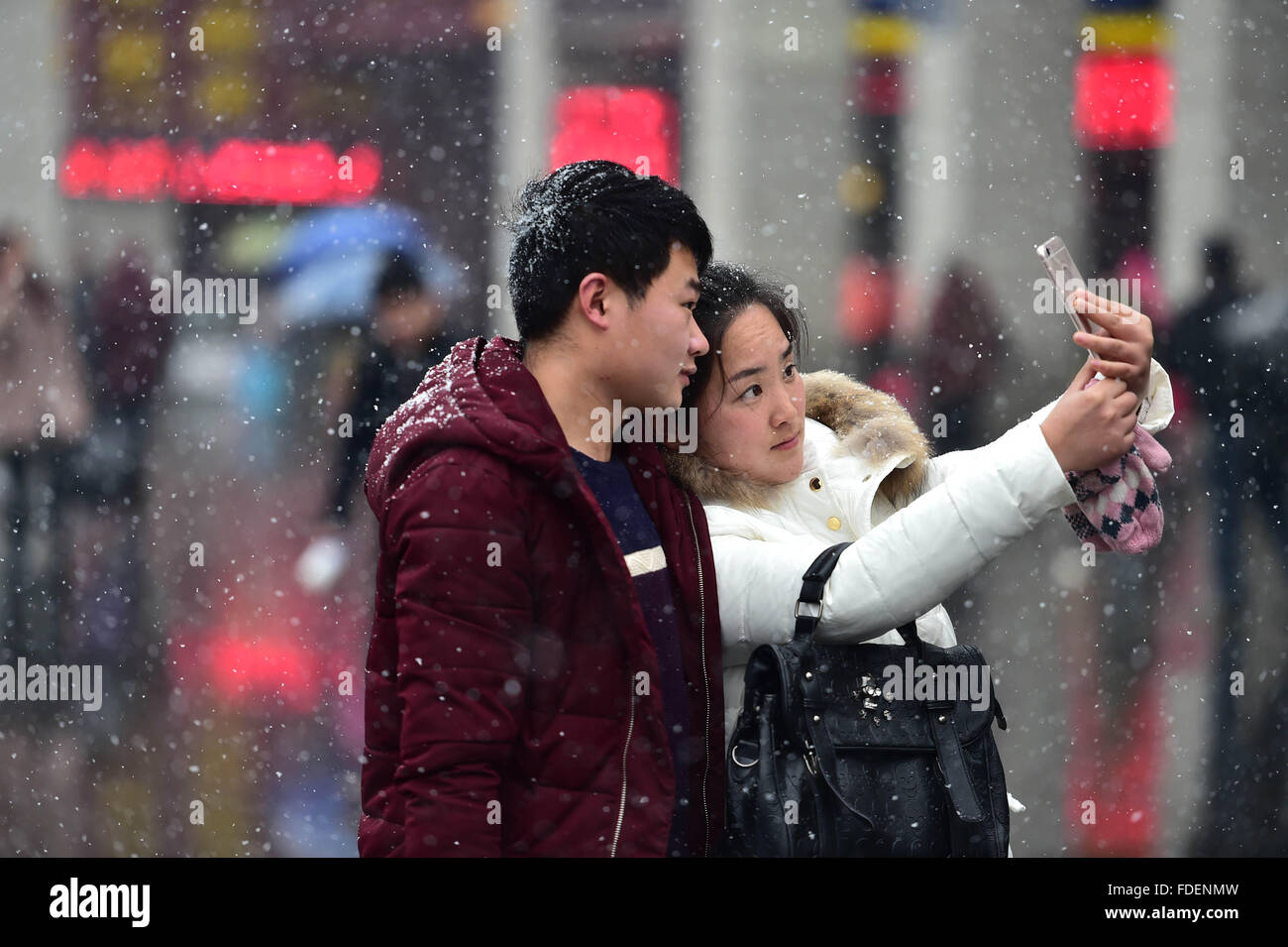 Hefei, China's Anhui Province. 31st January, 2016. Passengers pose for ...