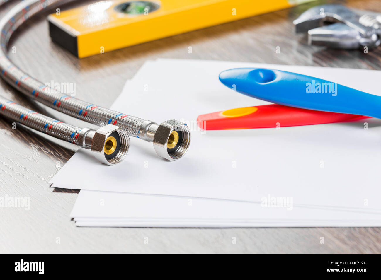 All kinds of plumbing and tools on sheet of paper Stock Photo - Alamy