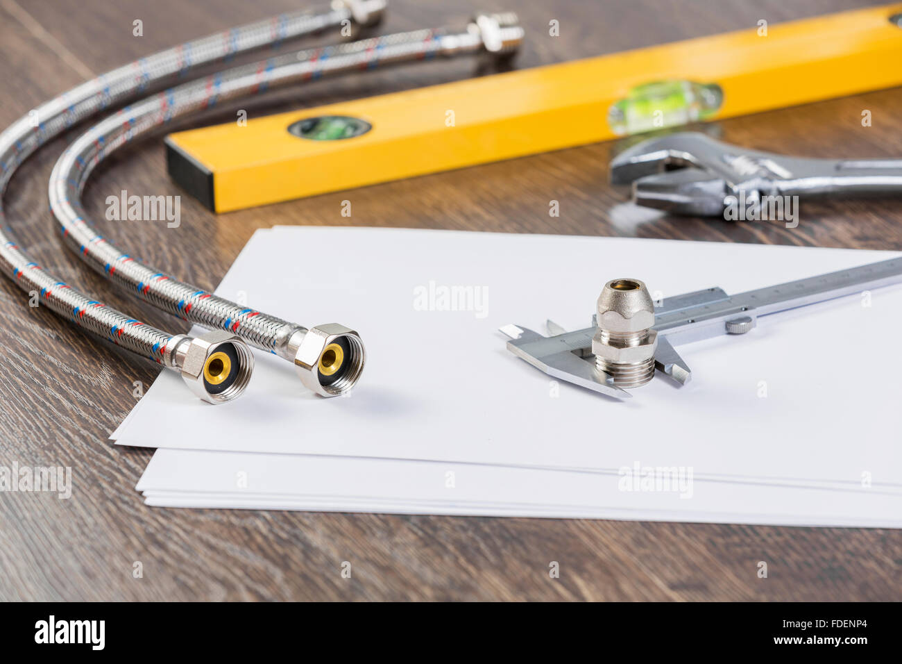 All kinds of plumbing and tools on sheet of paper Stock Photo - Alamy