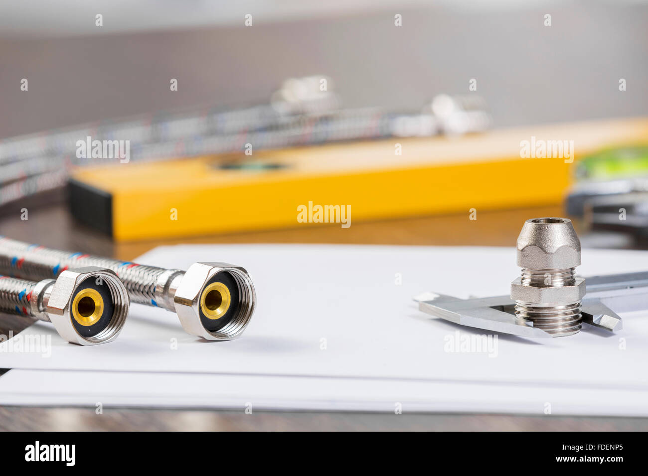 All kinds of plumbing and tools on sheet of paper Stock Photo - Alamy