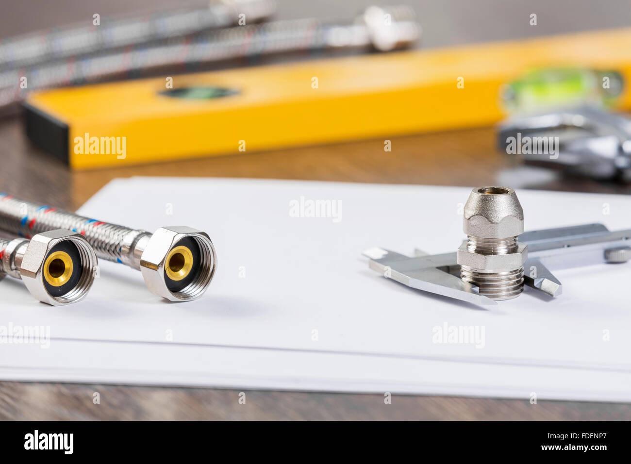 All kinds of plumbing and tools on sheet of paper Stock Photo - Alamy