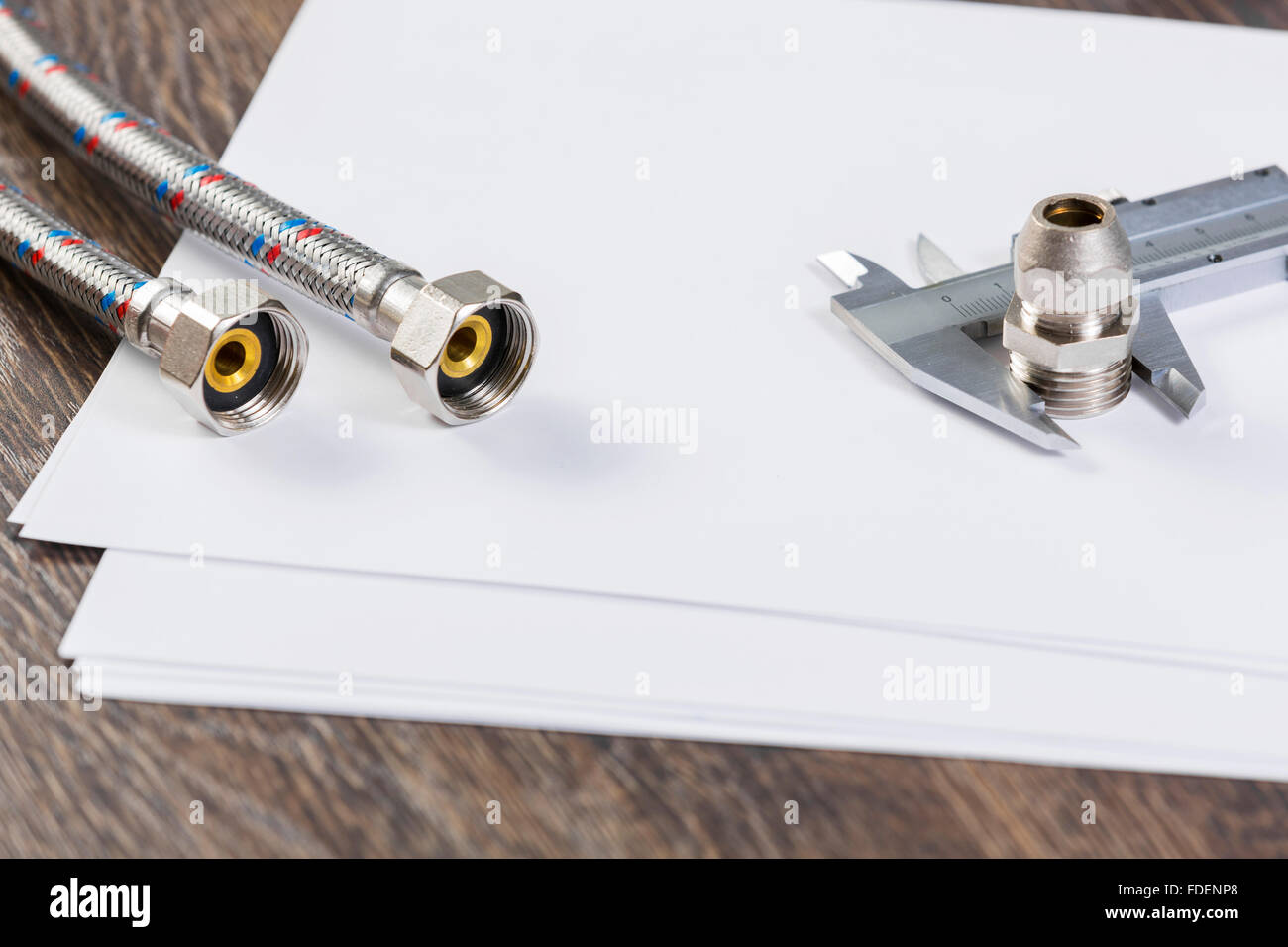 All kinds of plumbing and tools on sheet of paper Stock Photo - Alamy