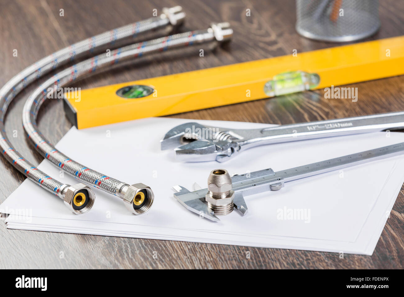 All kinds of plumbing and tools on sheet of paper Stock Photo - Alamy