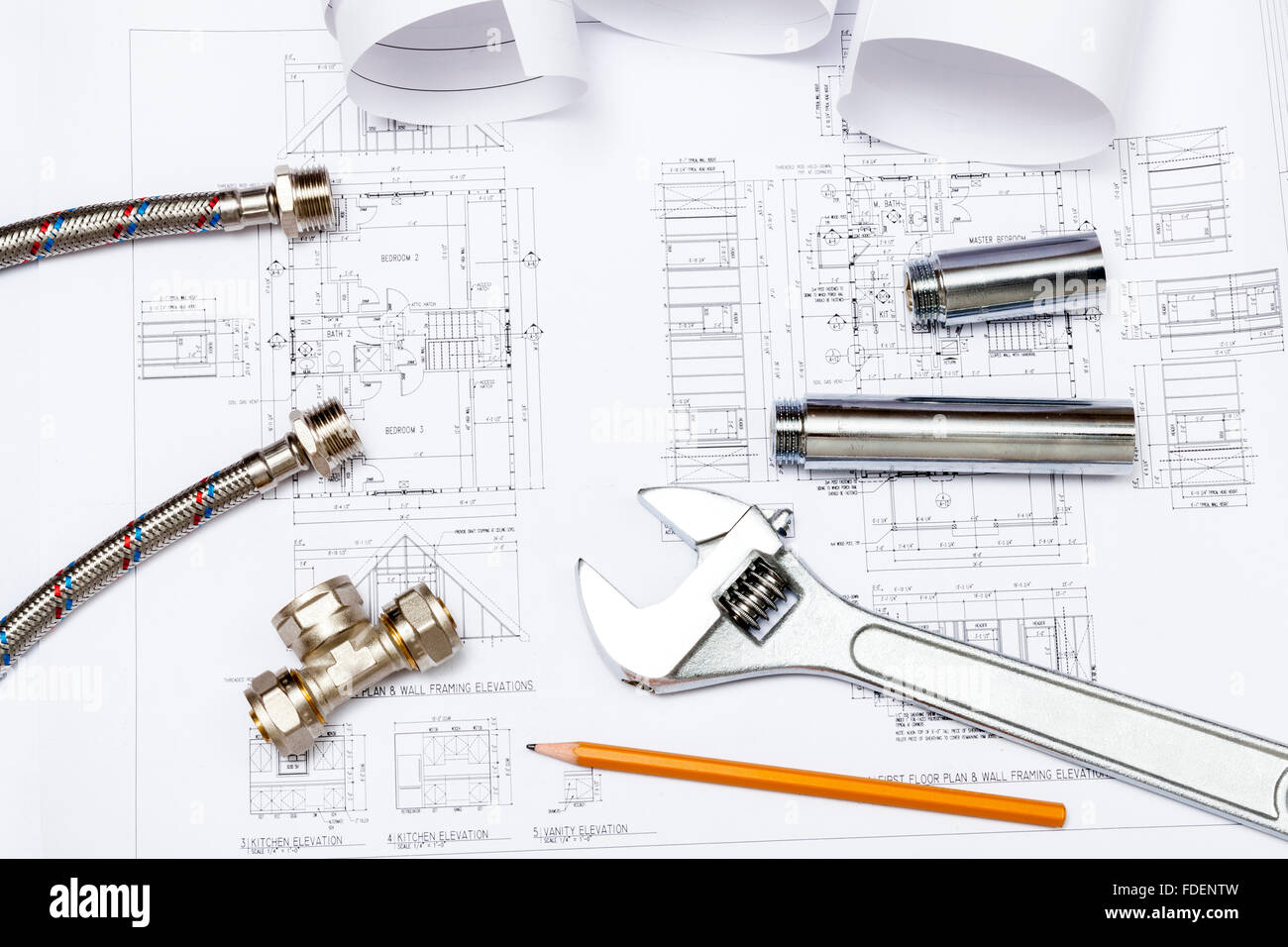 All kinds of plumbing and tools on sheet of paper Stock Photo - Alamy