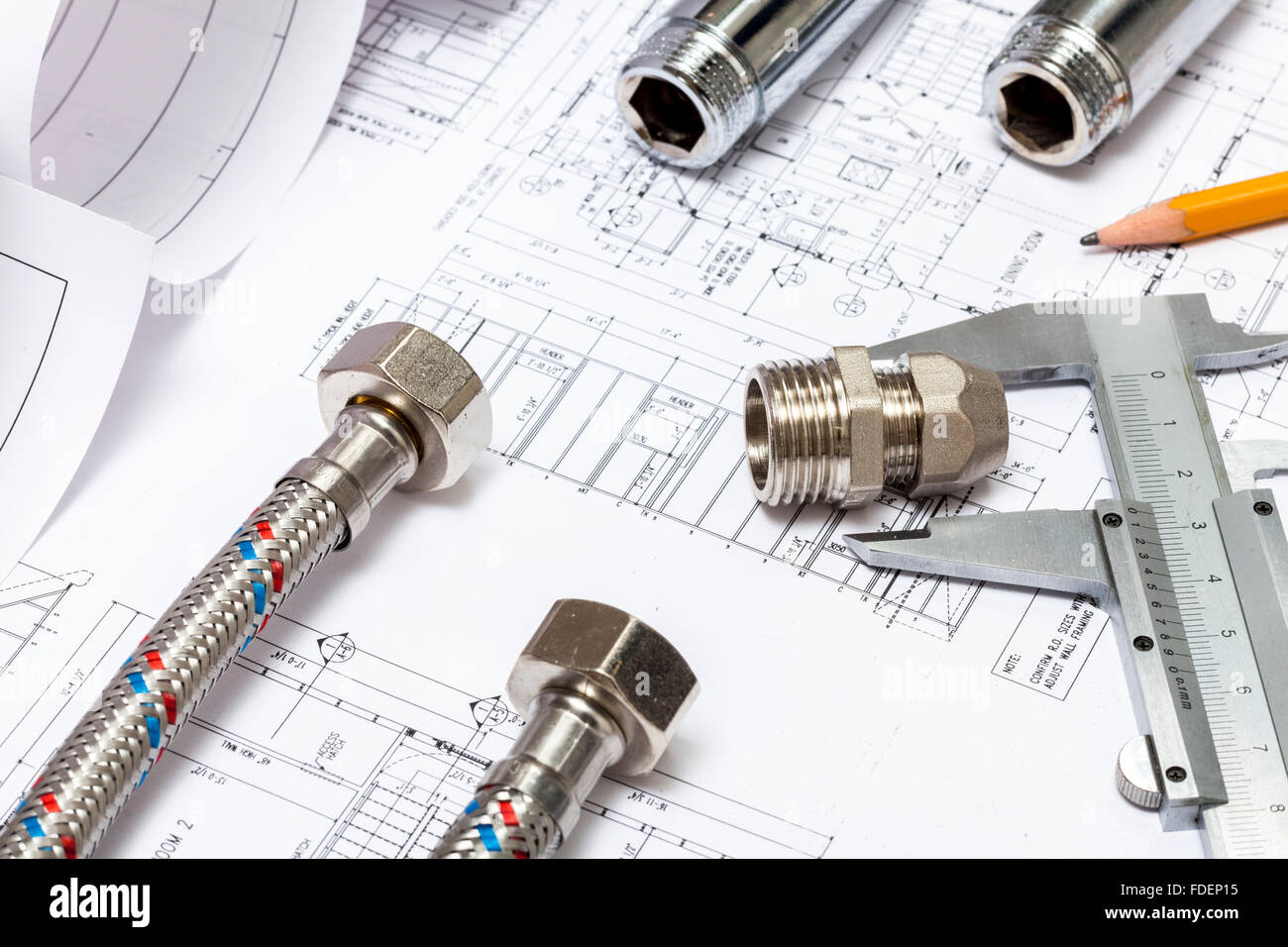 All kinds of plumbing and tools on sheet of paper Stock Photo - Alamy