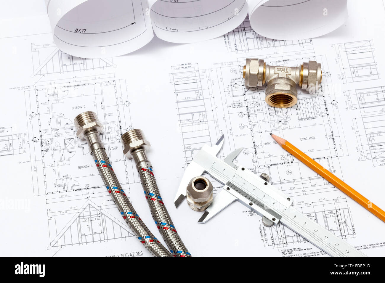 All kinds of plumbing and tools on sheet of paper Stock Photo - Alamy