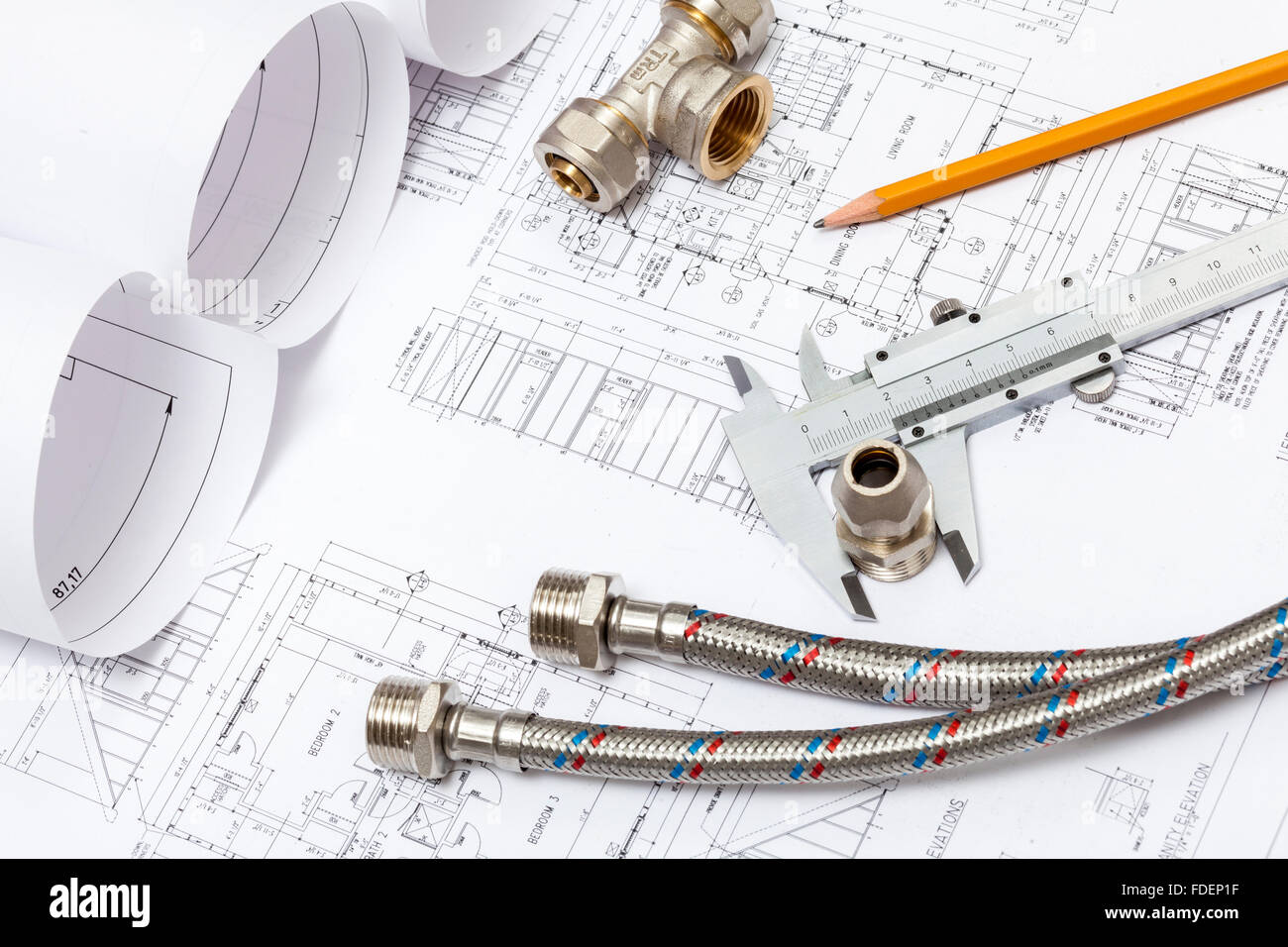 All kinds of plumbing and tools on sheet of paper Stock Photo - Alamy