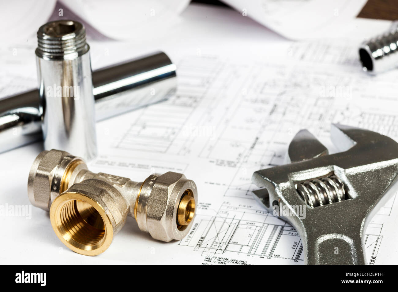 All kinds of plumbing and tools on sheet of paper Stock Photo - Alamy