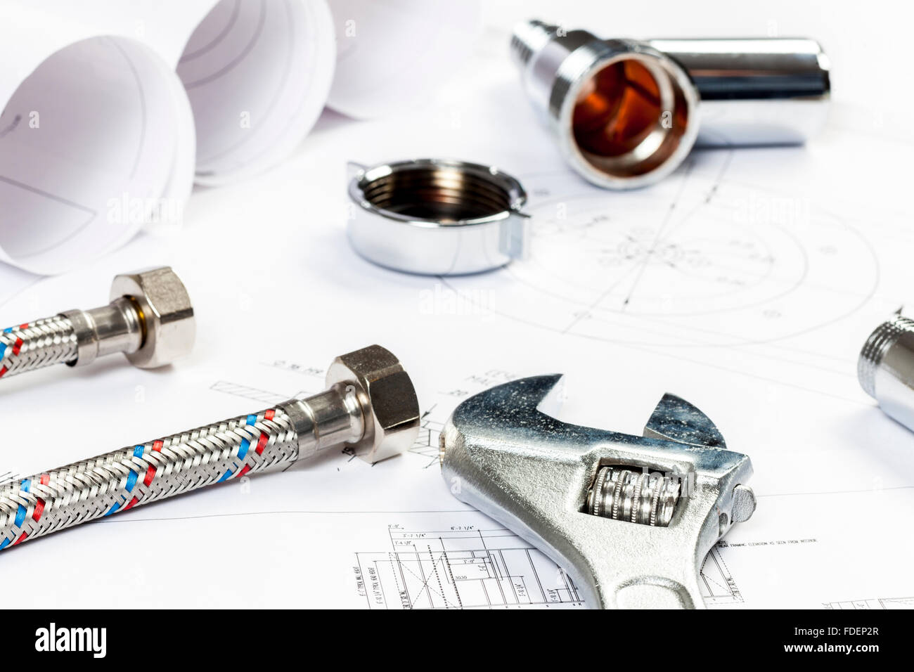 All kinds of plumbing and tools on sheet of paper Stock Photo - Alamy