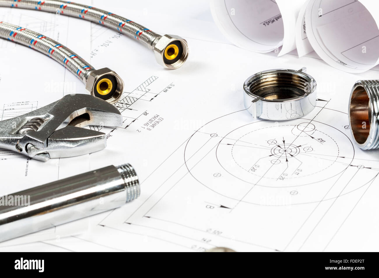 All kinds of plumbing and tools on sheet of paper Stock Photo - Alamy