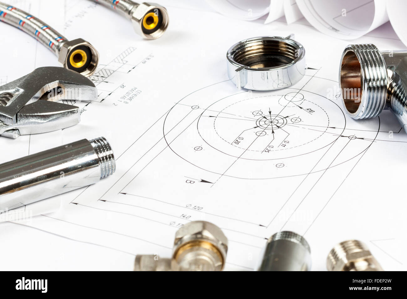 All kinds of plumbing and tools on sheet of paper Stock Photo - Alamy