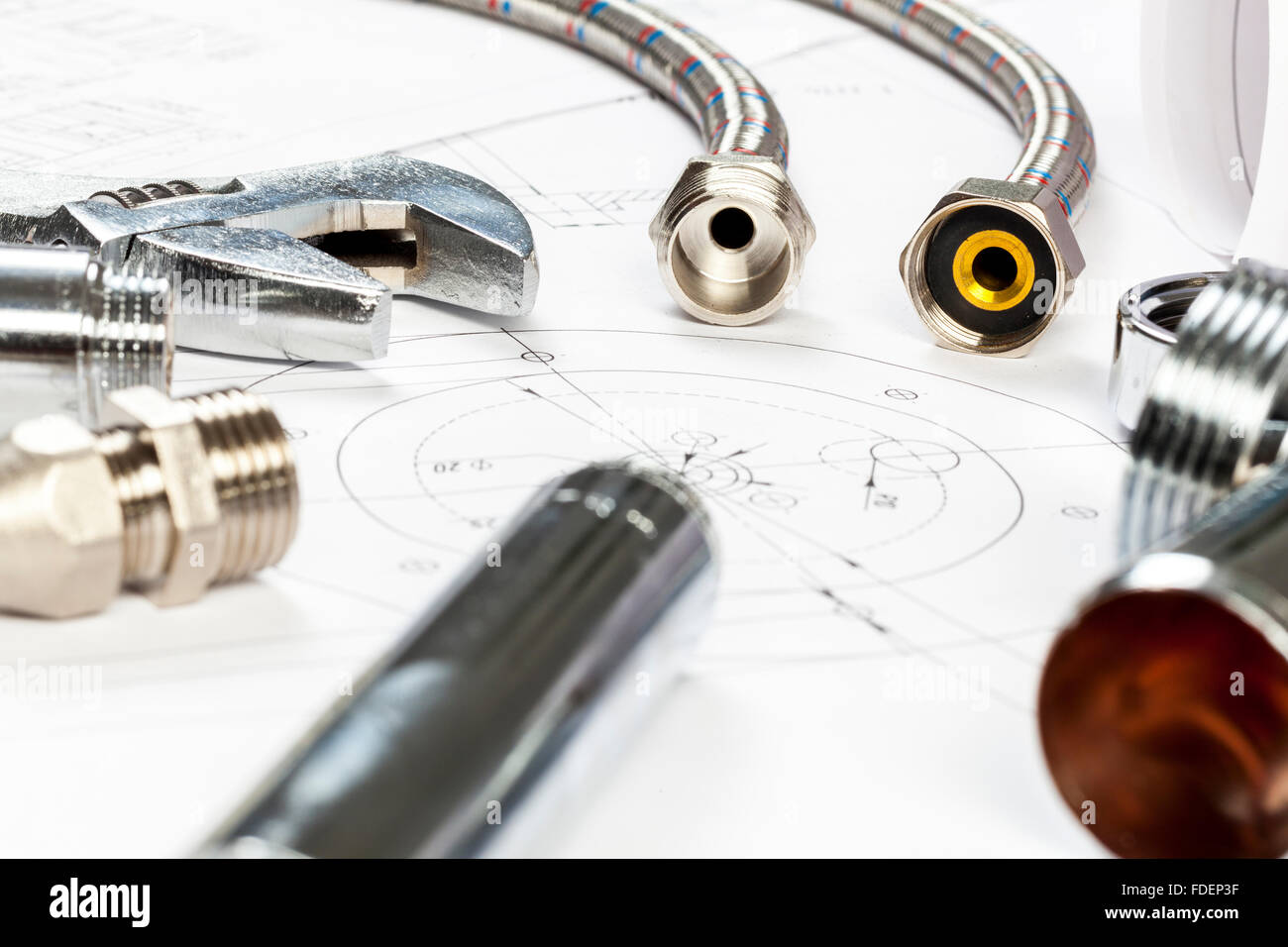 All kinds of plumbing and tools on sheet of paper Stock Photo - Alamy