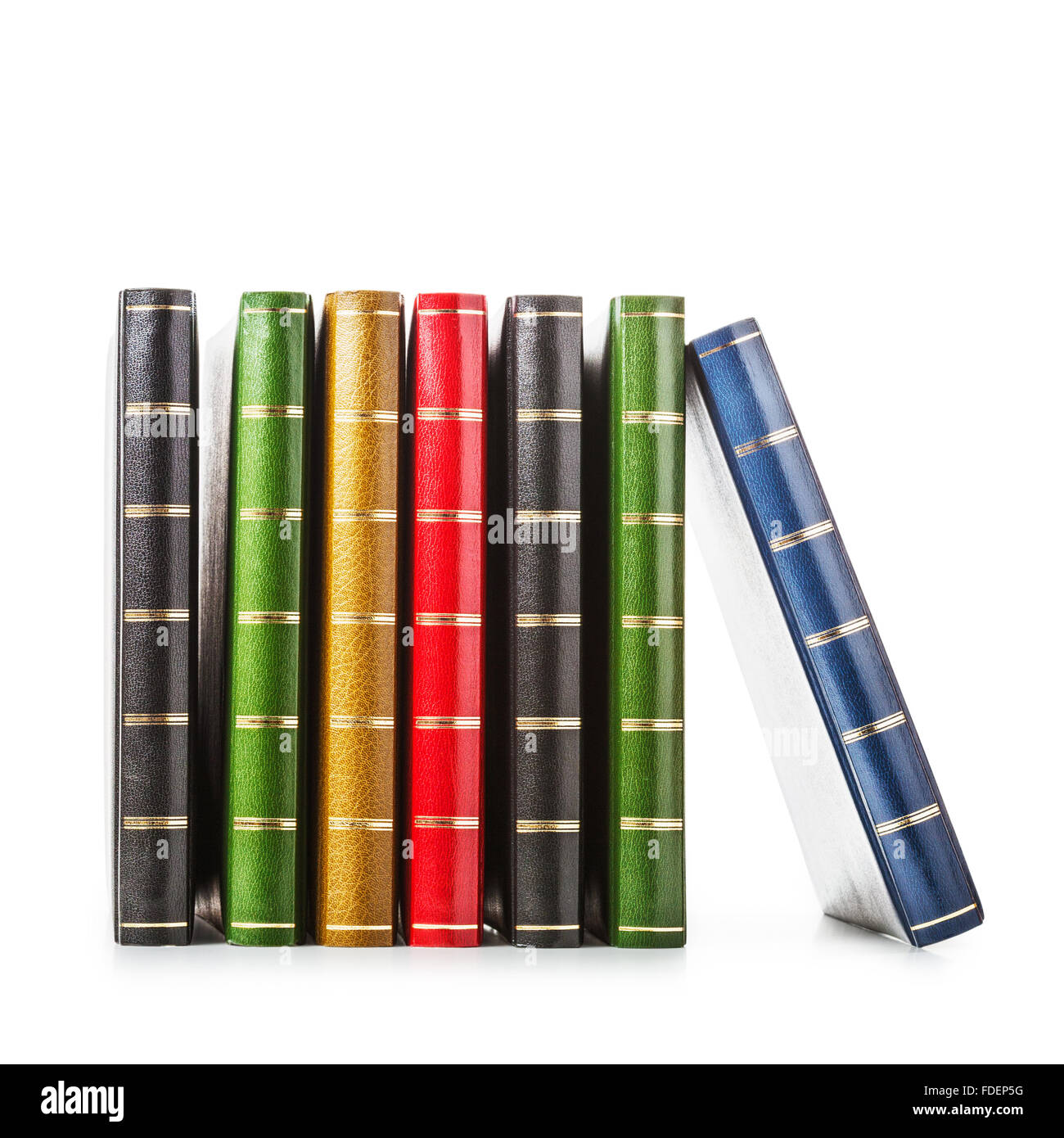 Photo albums.Vintage books in a row isolated on white background ...