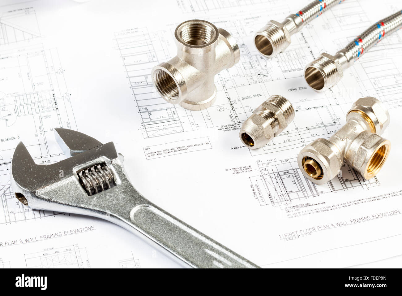All kinds of plumbing and tools on sheet of paper Stock Photo - Alamy