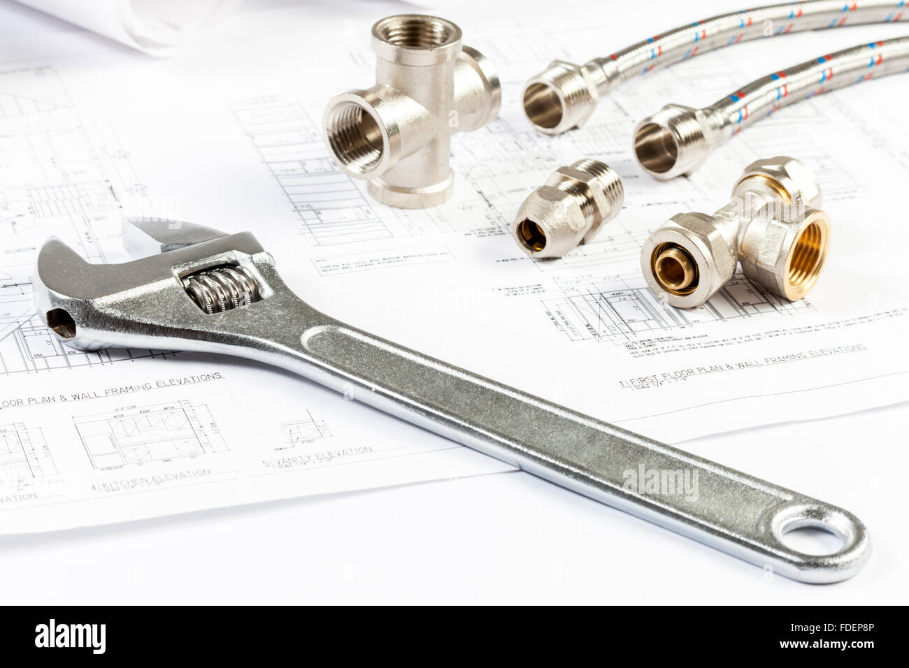 All kinds of plumbing and tools on sheet of paper Stock Photo - Alamy