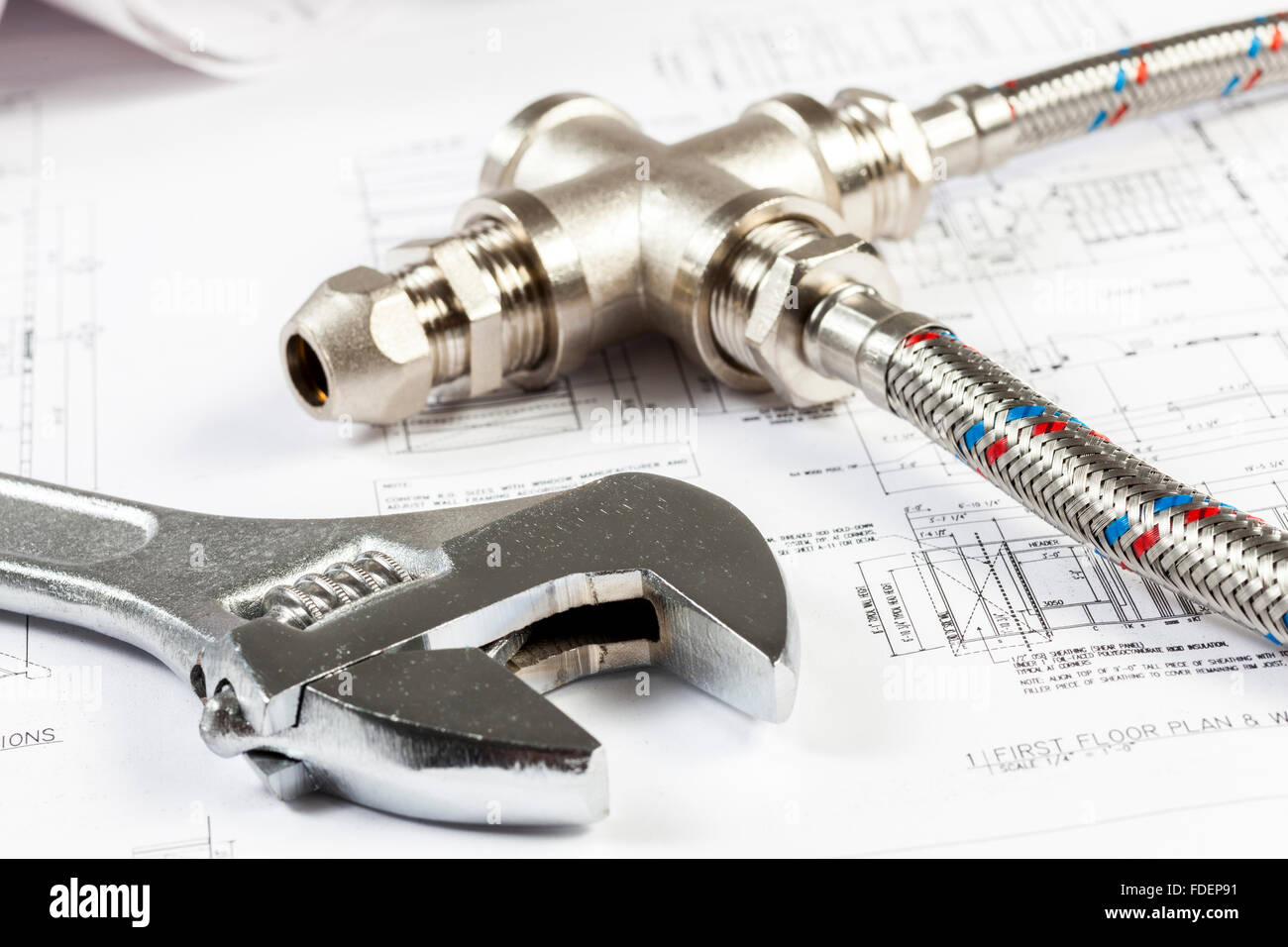 All kinds of plumbing and tools on sheet of paper Stock Photo - Alamy
