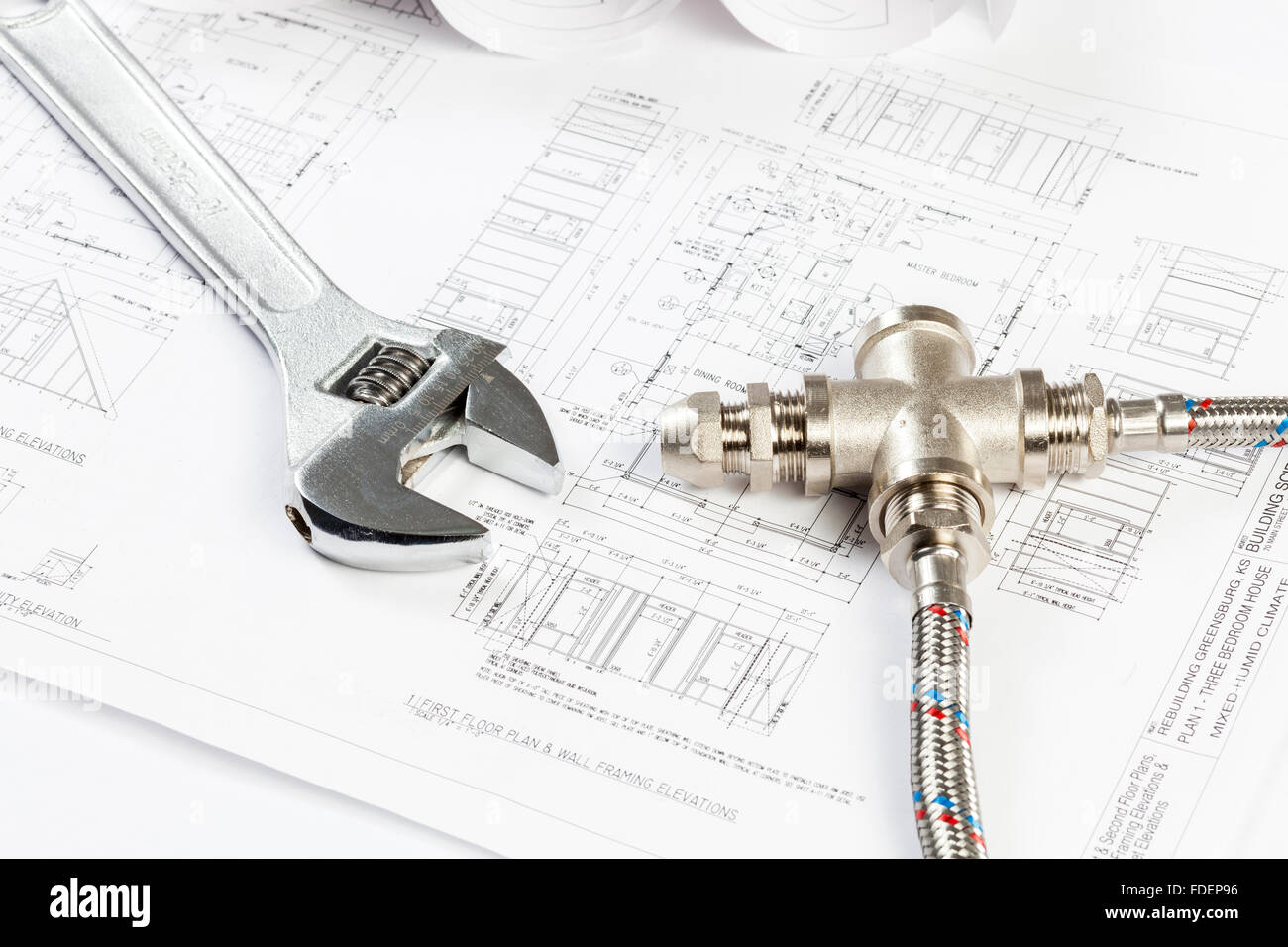 All kinds of plumbing and tools on sheet of paper Stock Photo - Alamy