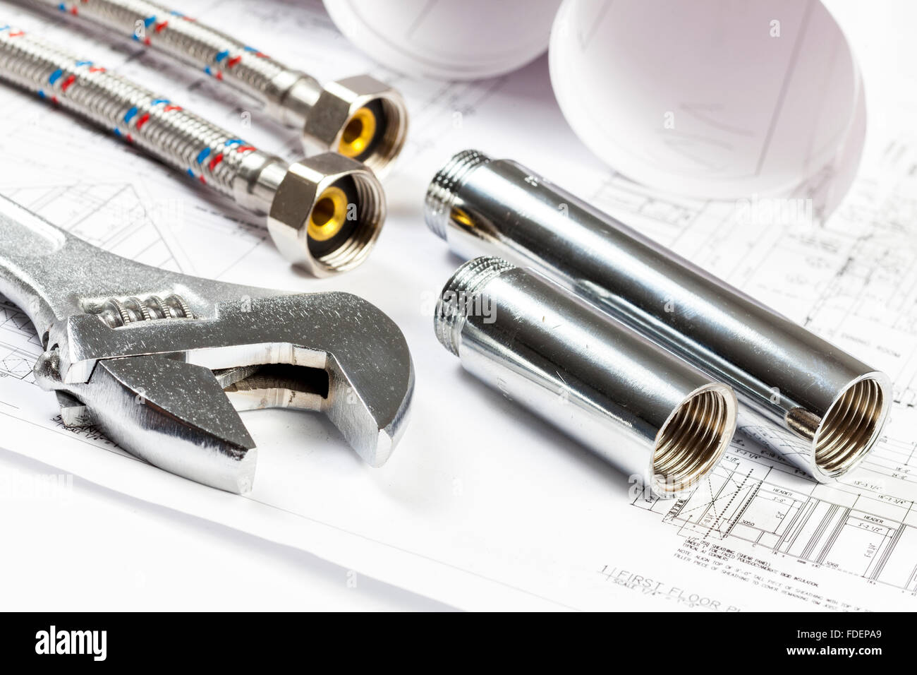 All kinds of plumbing and tools on sheet of paper Stock Photo - Alamy