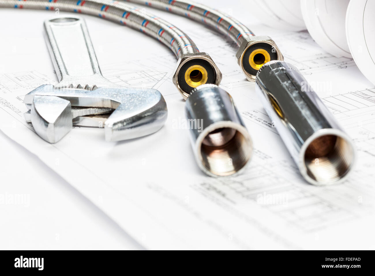 All kinds of plumbing and tools on sheet of paper Stock Photo - Alamy