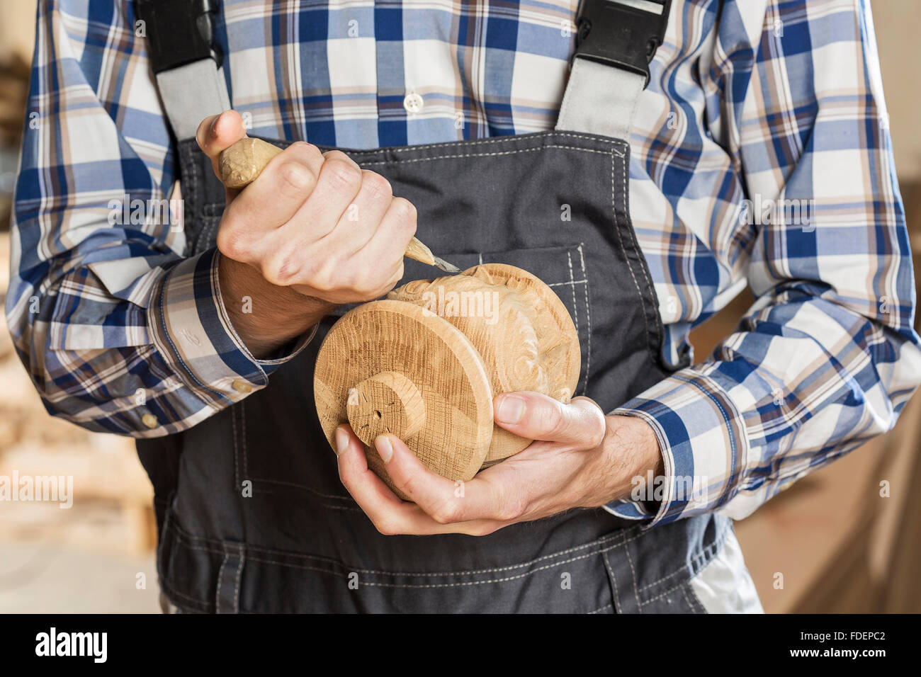 Close up carpenter's hands that work with cutter Stock Photo - Alamy
