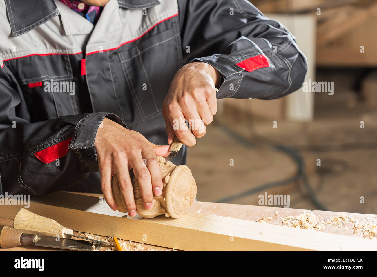 Close up of carpenter's hands working with cutter in his studio Stock ...