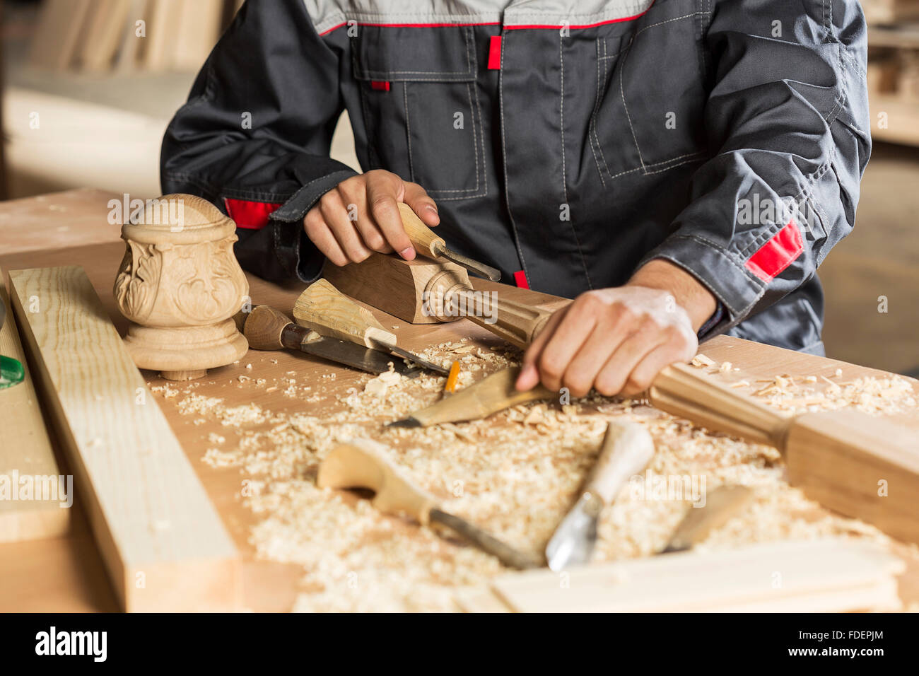 Close up of carpenter's hands working with cutter in his studio Stock ...