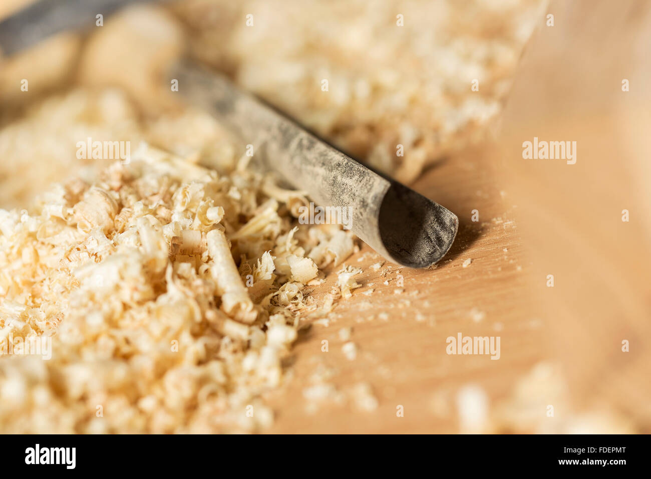 Cutters for wood and wood shavings on table Stock Photo - Alamy