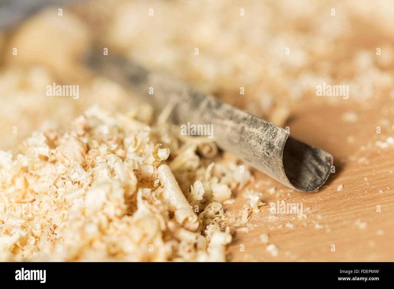 Cutters for wood and wood shavings on table Stock Photo - Alamy