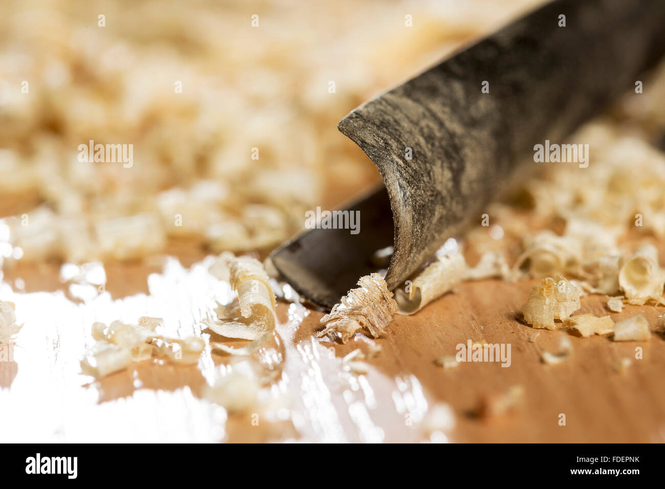 Cutters for wood and wood shavings on table Stock Photo - Alamy