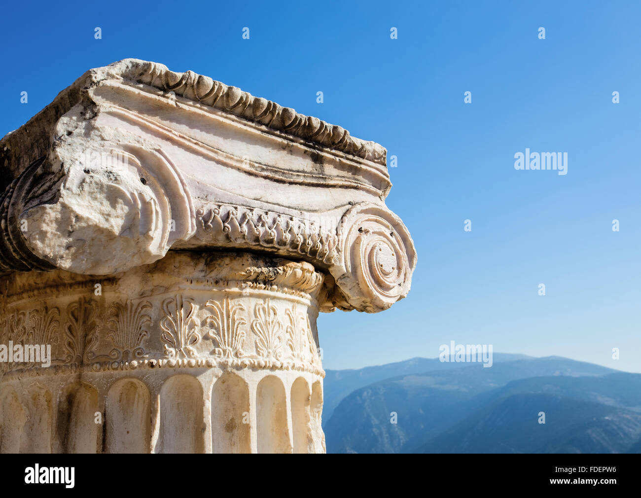 capital of Ionian order column in Ancient Delphi Stock Photo - Alamy