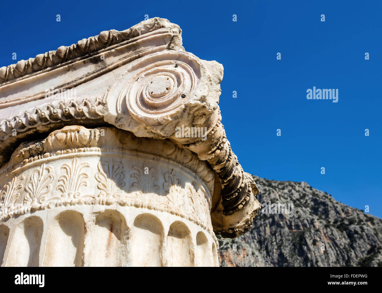 capital of Ionian order column in Ancient Delphi Stock Photo - Alamy