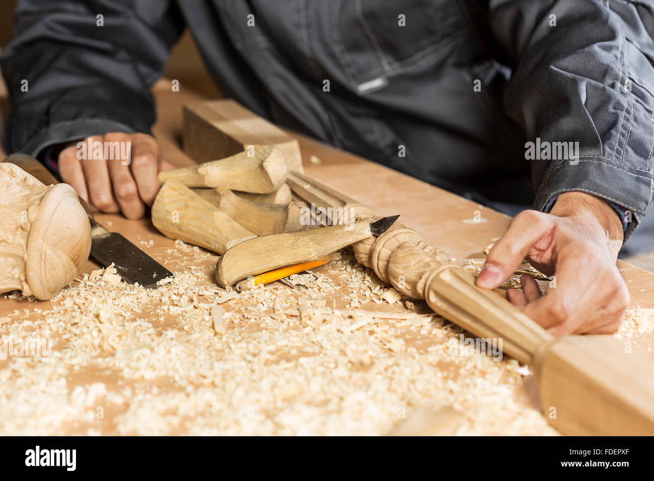 Close up of carpenter's hands working with cutter in his studio Stock ...