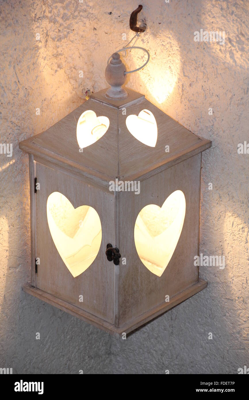romantic indoor lanterns with hearts Stock Photo - Alamy