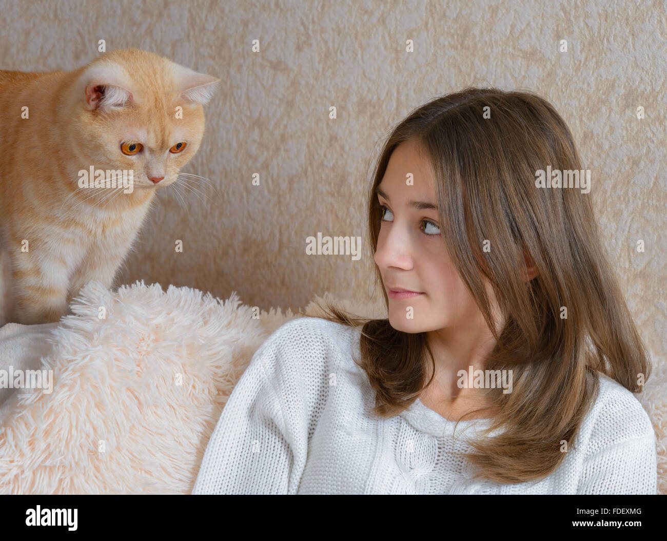 The girl and her red cat Stock Photo - Alamy