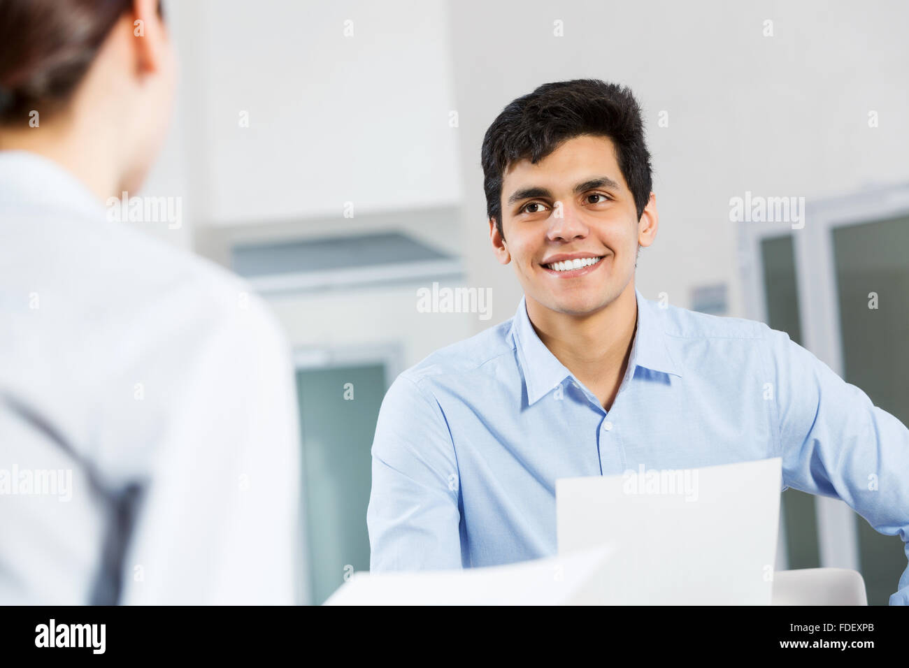 Two students discussion with paper hi-res stock photography and images ...