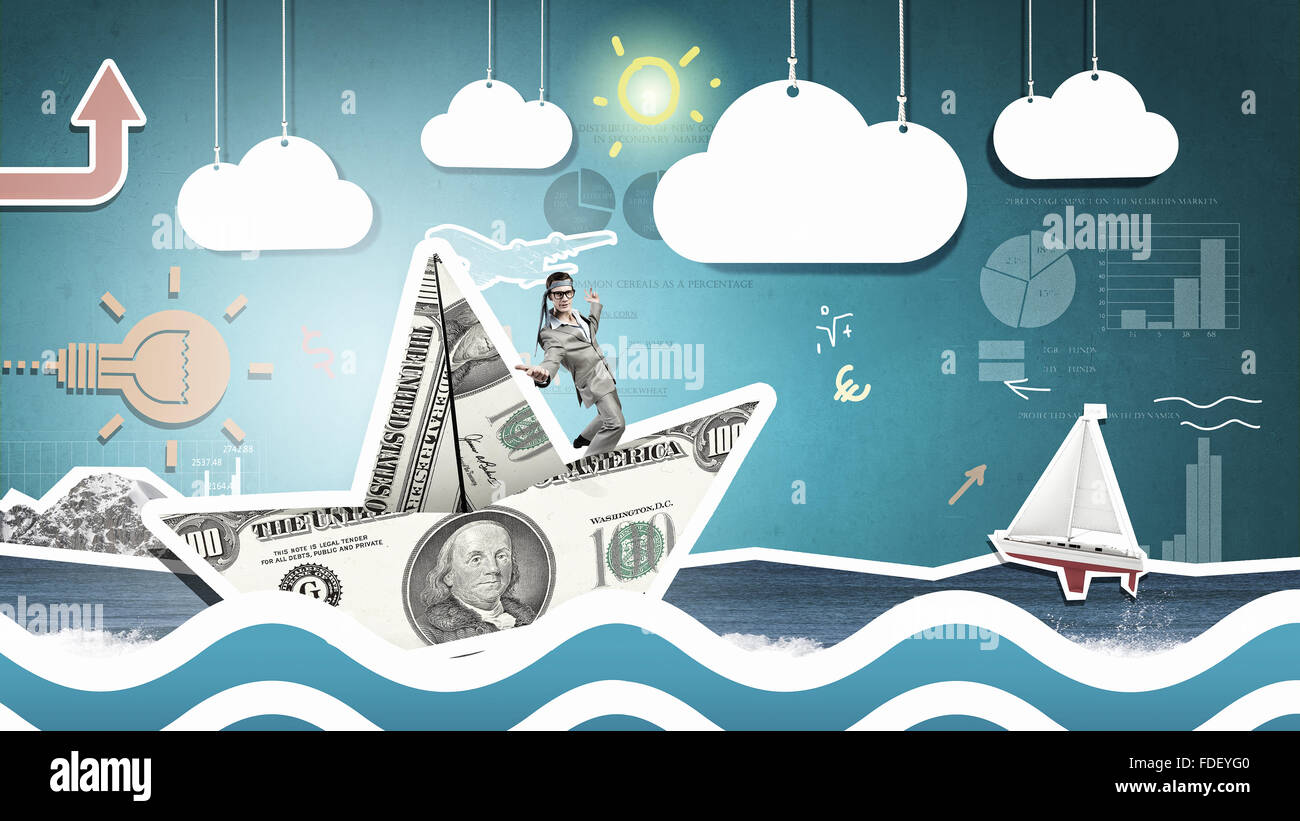 Ship made of dollar banknote floating in water Stock Photo - Alamy