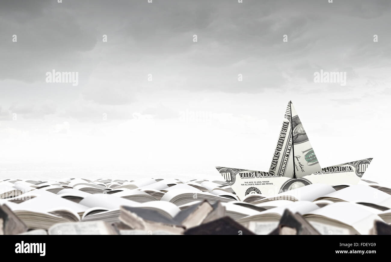 Ship made of dollar banknote floating in water Stock Photo - Alamy