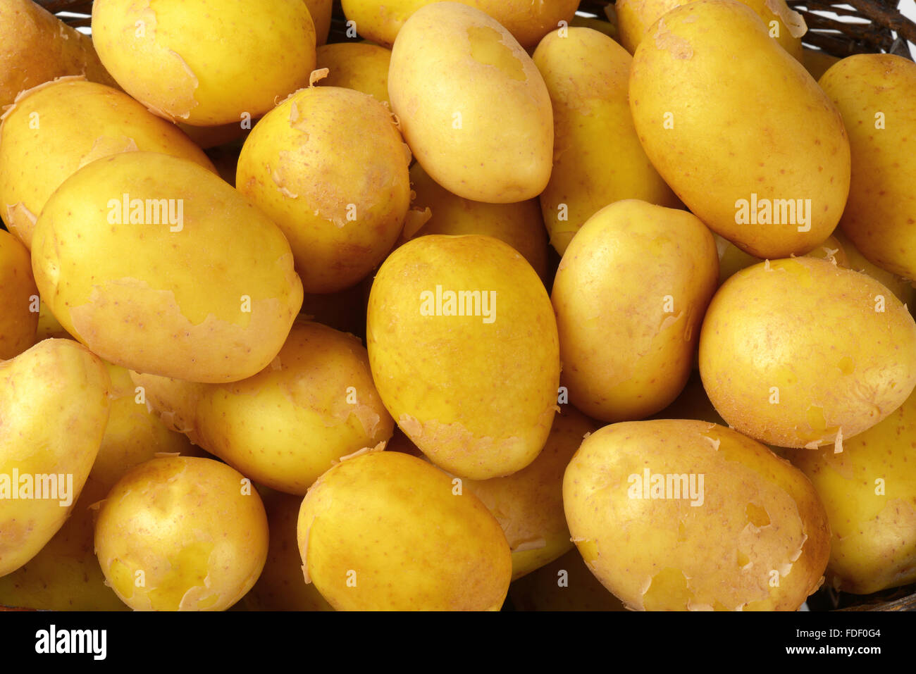 close up of fresh baby potatoes in wicker basket Stock Photo - Alamy