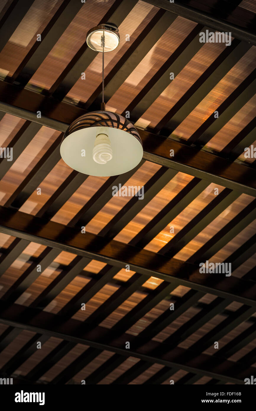 Light bulb hanging from ceiling hi-res stock photography and images - Alamy