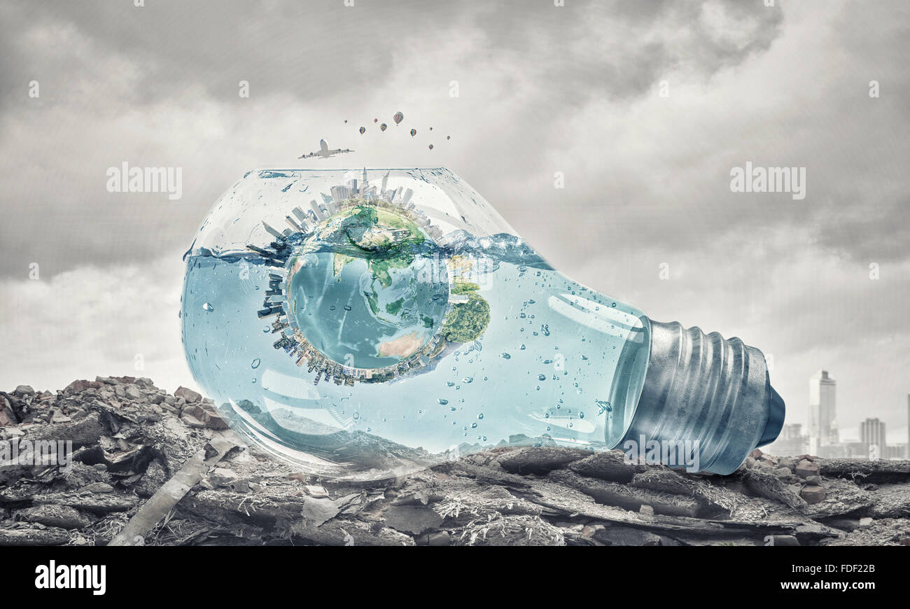 Glass light bulb filled with water and floating Earth planet. Elements ...