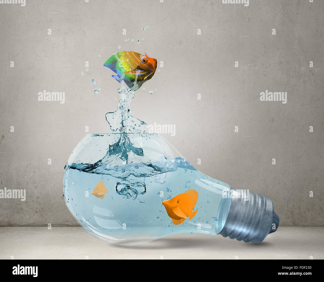 Exotic fish in water inside electric light bulb Stock Photo - Alamy