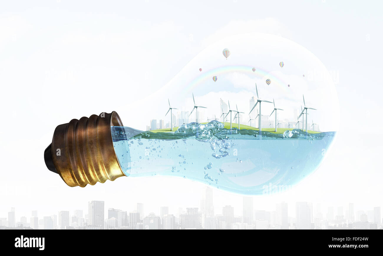 Eco energy concept with windmills inside of light bulb Stock Photo - Alamy