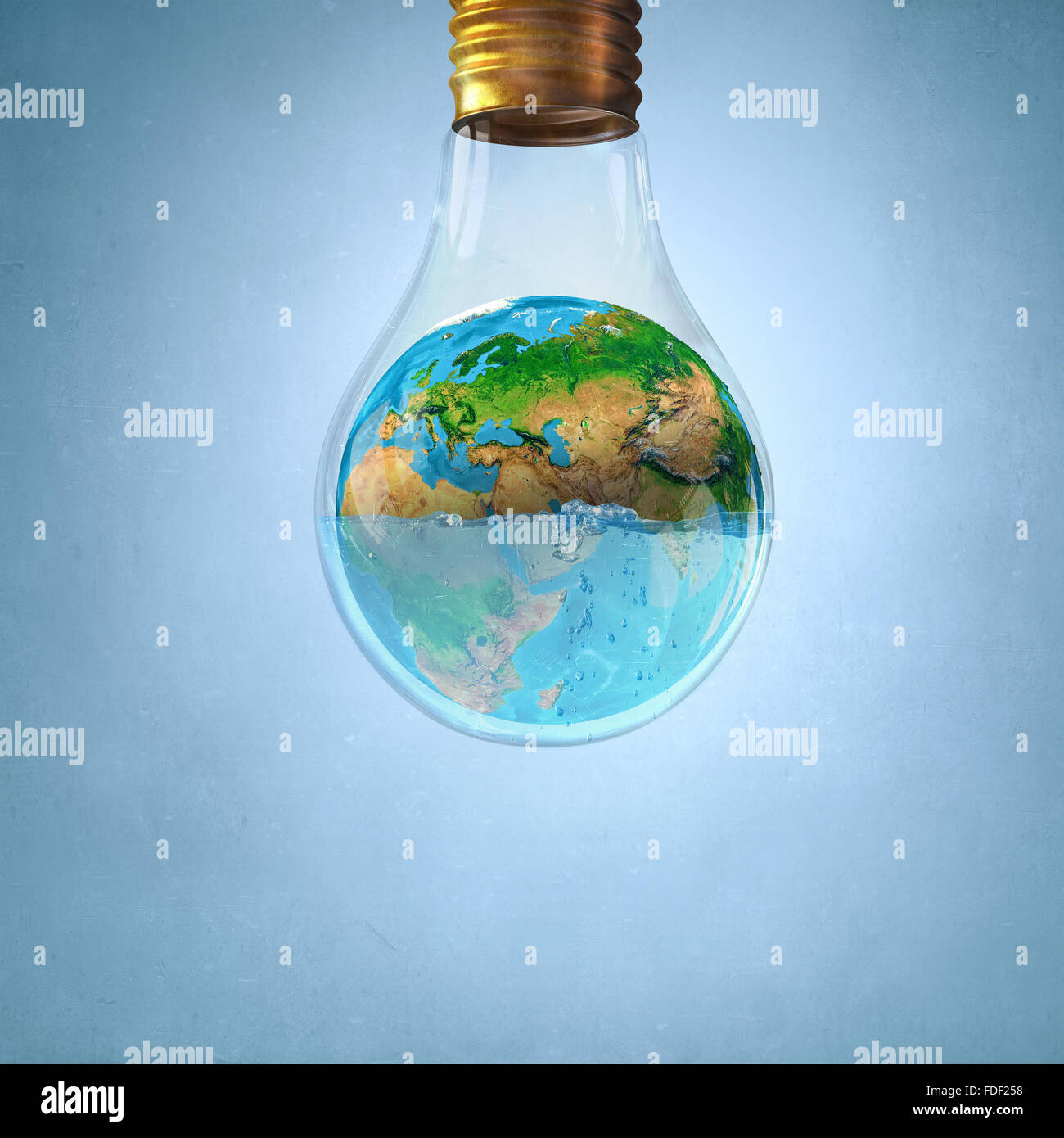 Glass light bulb filled with water and floating Earth planet. Elements ...